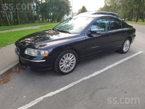 Black Volvo S60 2008 in Riga, with an engine capacity of 2.40 L and mileage of 315 thousand km for 1799 €, photo 1 on AUTOMOTO.COM.LV