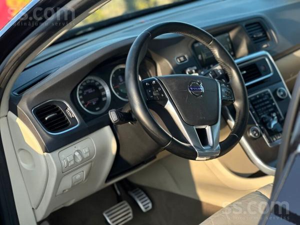 Black Volvo S60 2011 in Jelgava, with an engine capacity of 2.40 L and mileage of 0 thousand km for 6990 €, photo 8 on AUTOMOTO.COM.LV