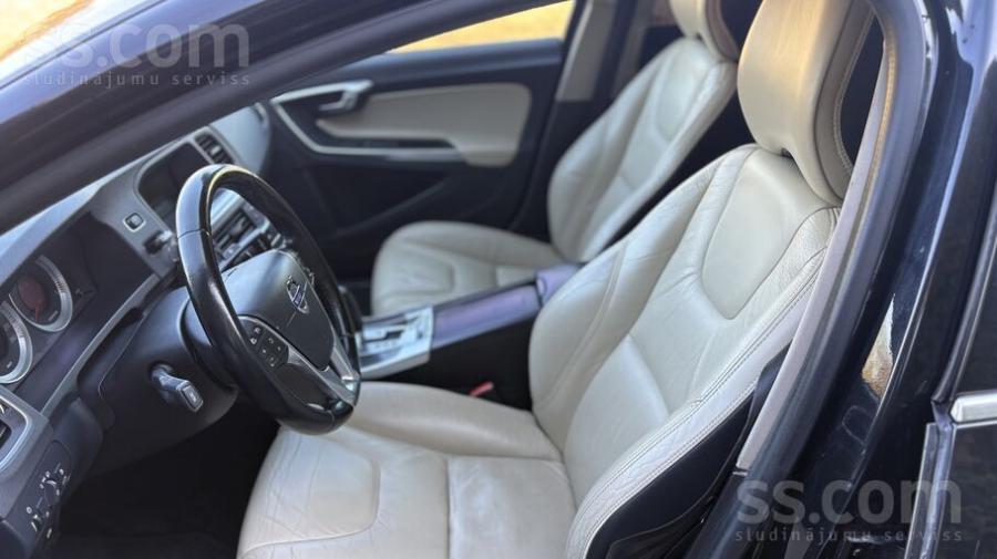 Melns Volvo S60 2011 Rīga, ar dzinēja tilpumu 2.40 L un nobraukumu 360 tūkst. km par 4990 €, foto 7 vietnē AUTOMOTO.COM.LV