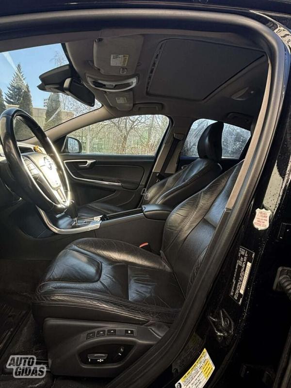 Black Volvo S60 2012 in Vilnius, with an engine capacity of 2.50 L and mileage of 220 thousand km for 4800 €, photo 9 on AUTOMOTO.COM.LV