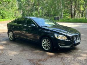 Black Volvo S60 2014 in Riga, with an engine capacity of 2.00 L and mileage of 0 thousand km for 6599 €, photo 8 on AUTOMOTO.COM.LV