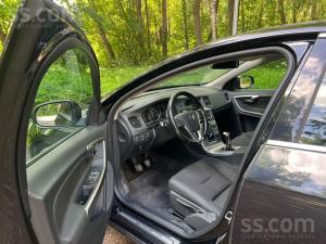 Black Volvo S60 2014 in Riga, with an engine capacity of 2.00 L and mileage of 0 thousand km for 6599 €, photo 10 on AUTOMOTO.COM.LV
