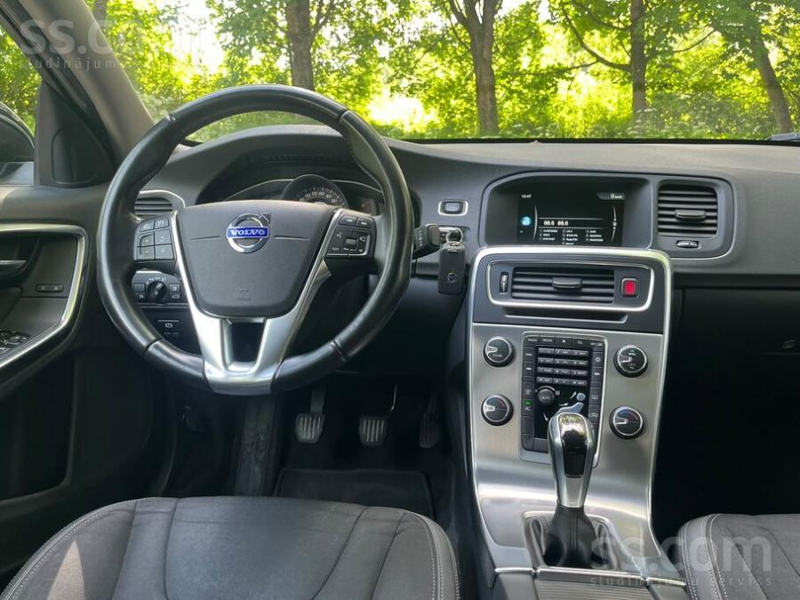 Black Volvo S60 2014 in Riga, with an engine capacity of 2.00 L and mileage of 0 thousand km for 6599 €, photo 12 on AUTOMOTO.COM.LV
