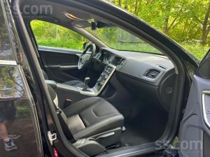 Black Volvo S60 2014 in Riga, with an engine capacity of 2.00 L and mileage of 0 thousand km for 6599 €, photo 23 on AUTOMOTO.COM.LV