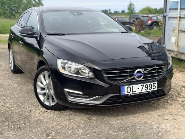 Black Volvo S60 2014 in Riga, with an engine capacity of 2.00 L and mileage of 142 thousand km for 9995 €, photo 1 on AUTOMOTO.COM.LV
