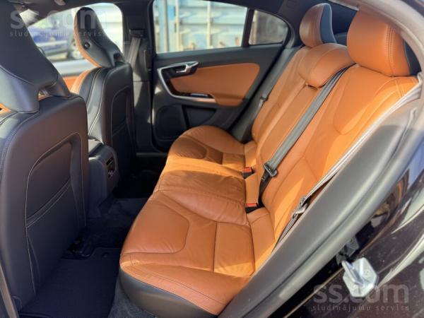 Black Volvo S60 2014 in Riga, with an engine capacity of 2.00 L and mileage of 142 thousand km for 9995 €, photo 6 on AUTOMOTO.COM.LV