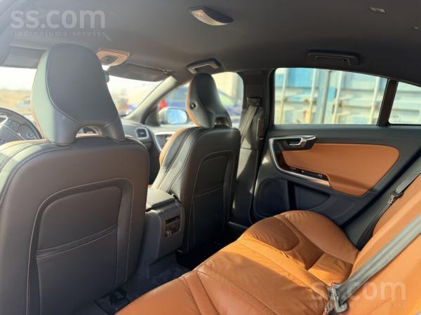 Black Volvo S60 2014 in Riga, with an engine capacity of 2.00 L and mileage of 142 thousand km for 9995 €, photo 7 on AUTOMOTO.COM.LV