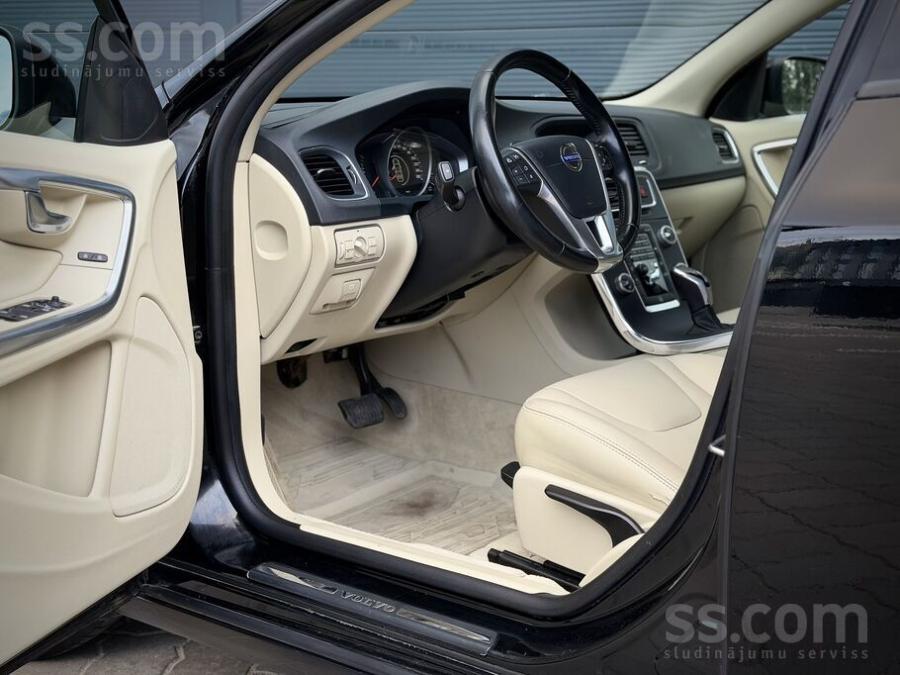 Black Volvo S60 2014 in Riga, with an engine capacity of 1.60 L and mileage of 224 thousand km for 7299 €, photo 9 on AUTOMOTO.COM.LV