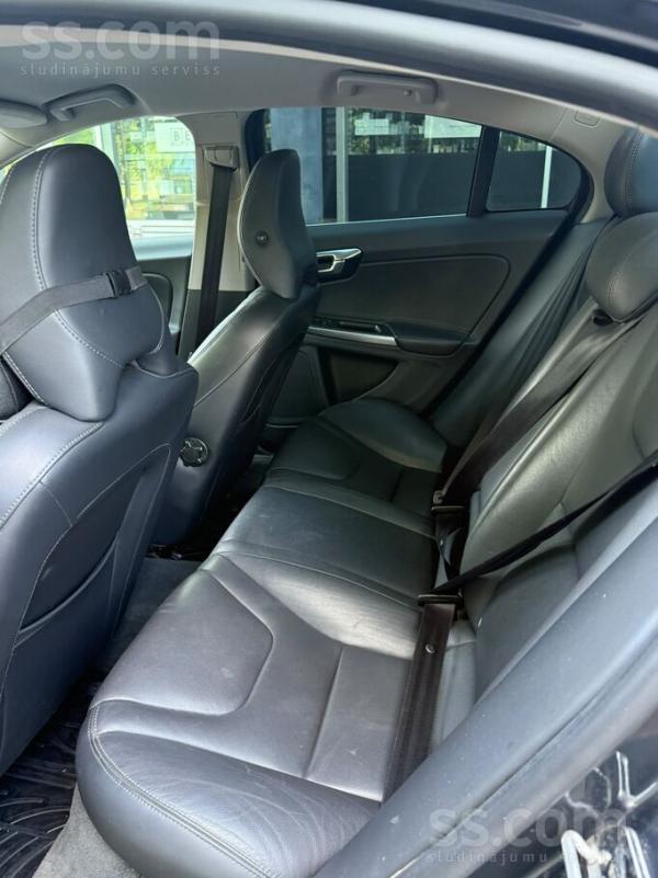 Black Volvo S60 2014 in Riga, with an engine capacity of 2.00 L and mileage of 0 thousand km for 7500 €, photo 9 on AUTOMOTO.COM.LV