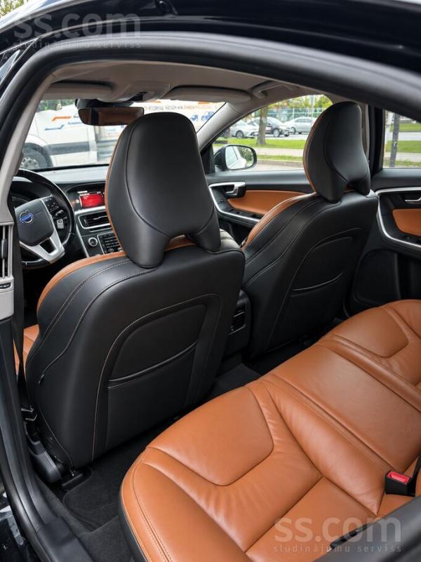 Black Volvo S60 2014 in Riga, with an engine capacity of 2.00 L and mileage of 300 thousand km for 5600 €, photo 4 on AUTOMOTO.COM.LV