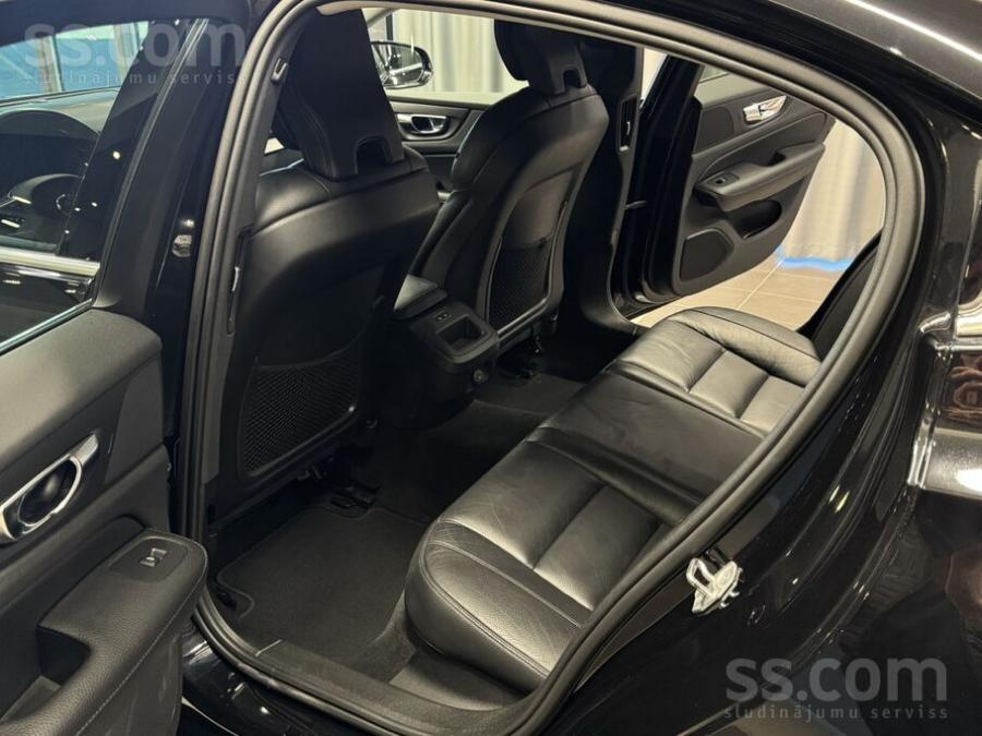 Black Volvo S60 2021 in Riga, with an engine capacity of 2.00 L and mileage of 180 thousand km for 19990 €, photo 28 on AUTOMOTO.COM.LV