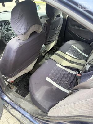 Blue Volvo S60 2003 in Jonava, with an engine capacity of 2.40 L and mileage of 400 thousand km for 450 €, photo 12 on AUTOMOTO.COM.LV