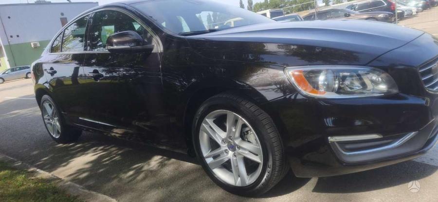 Brown Volvo S60 2015 in Klaipeda, with an engine capacity of 2.00 L and mileage of 200 thousand km for 5200 €, photo 12 on AUTOMOTO.COM.LV