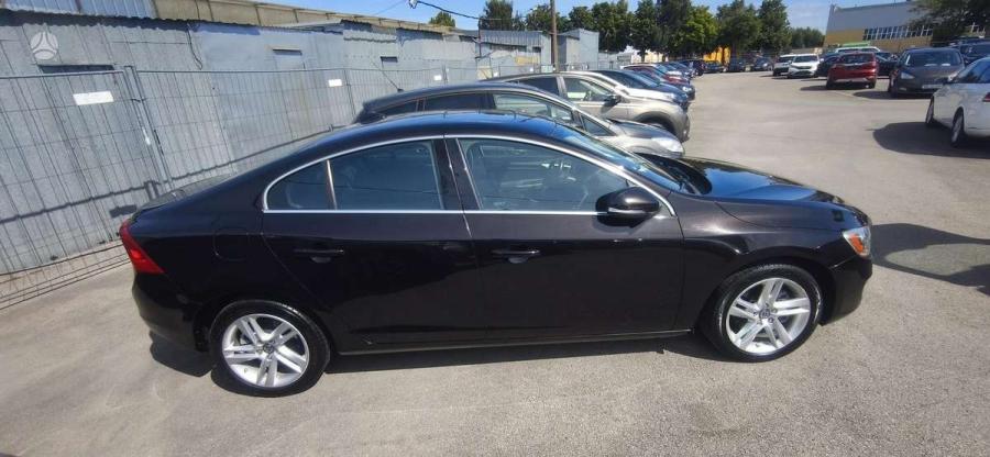 Brown Volvo S60 2015 in Klaipeda, with an engine capacity of 2.00 L and mileage of 200 thousand km for 5200 €, photo 16 on AUTOMOTO.COM.LV