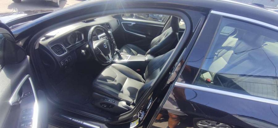 Brown Volvo S60 2015 in Klaipeda, with an engine capacity of 2.00 L and mileage of 200 thousand km for 5200 €, photo 23 on AUTOMOTO.COM.LV