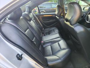 Grey Volvo S60 2003 in Taurage, with an engine capacity of 2.40 L and mileage of 421 thousand km for 1450 €, photo 14 on AUTOMOTO.COM.LV
