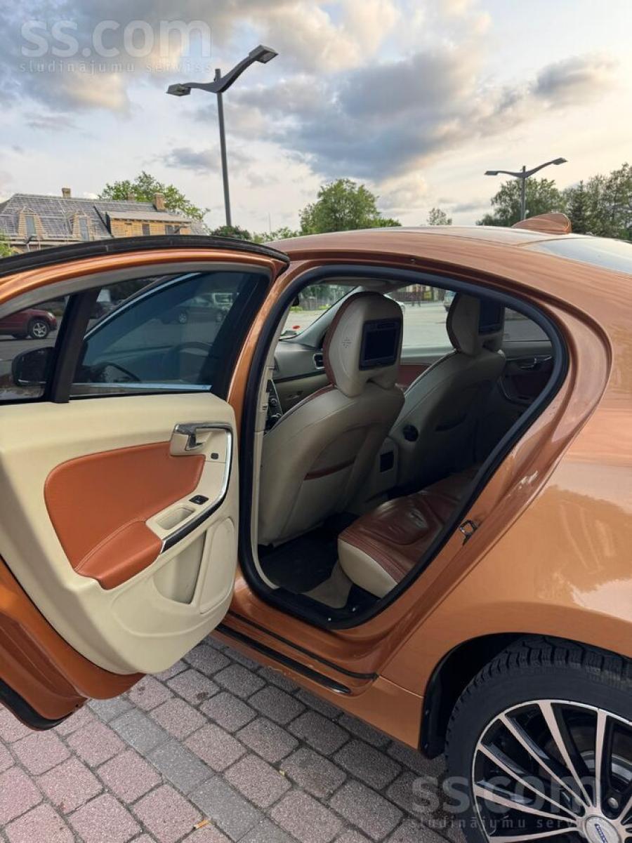 Oranžs Volvo S60 2010 Valmiera, ar dzinēja tilpumu 2.40 L un nobraukumu 292 tūkst. km par 6000 €, foto 7 vietnē AUTOMOTO.COM.LV