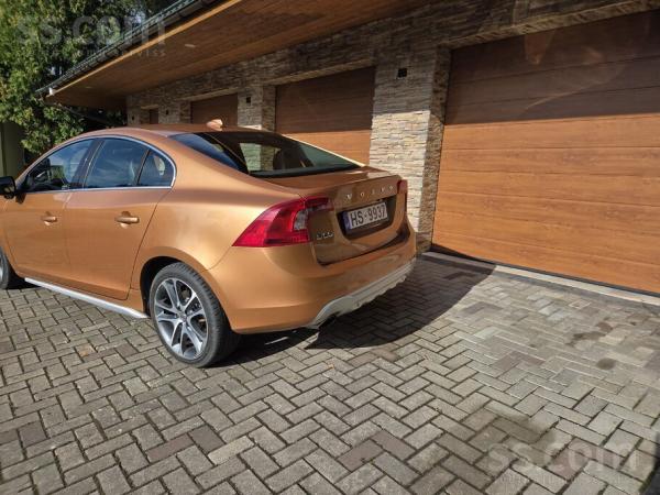 Orange Volvo S60 2010 in Ogre, with an engine capacity of 2.00 L and mileage of 192 thousand km for 5500 €, photo 9 on AUTOMOTO.COM.LV