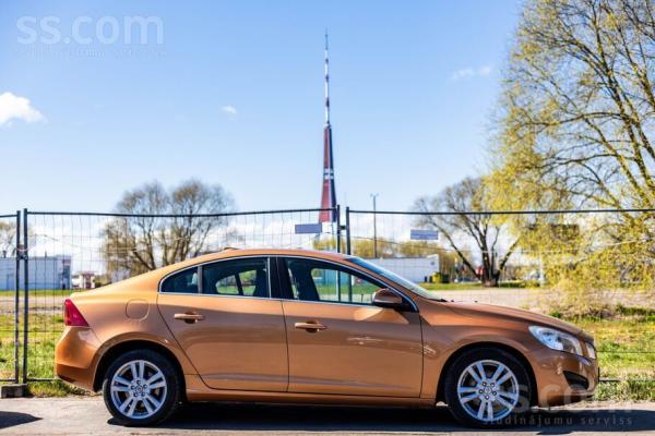 Orange Volvo S60 2011 in Riga, with an engine capacity of 2.00 L and mileage of 275 thousand km for 5490 €, photo 5 on AUTOMOTO.COM.LV