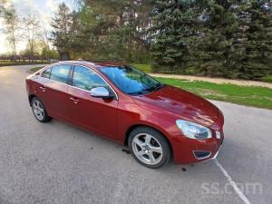 Red Volvo S60 2010 in Riga, with an engine capacity of 2.00 L and mileage of 244 thousand km for 4500 €, photo 13 on AUTOMOTO.COM.LV