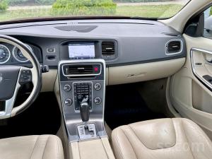 Red Volvo S60 2010 in Riga, with an engine capacity of 2.00 L and mileage of 244 thousand km for 4990 €, photo 17 on AUTOMOTO.COM.LV
