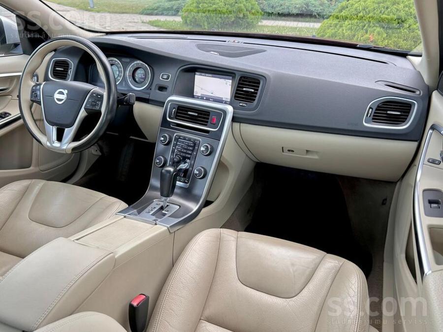 Red Volvo S60 2010 in Riga, with an engine capacity of 2.00 L and mileage of 244 thousand km for 4990 €, photo 18 on AUTOMOTO.COM.LV