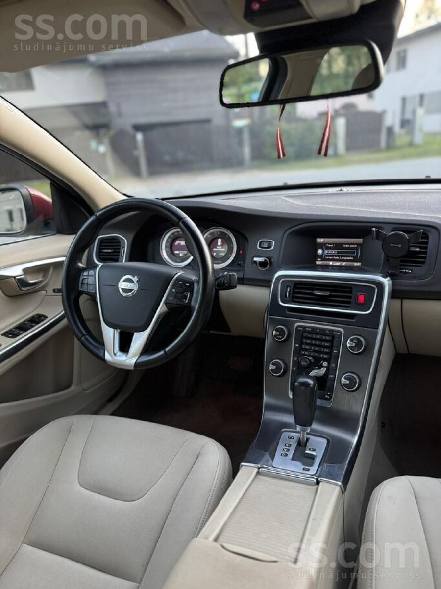 Red Volvo S60 2012 in Riga, with an engine capacity of 2.00 L and mileage of 260 thousand km for 4300 €, photo 6 on AUTOMOTO.COM.LV