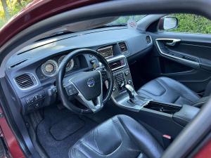 Red Volvo S60 2013 in Vilnius, with an engine capacity of 2.50 L and mileage of 102 thousand km for 3999 €, photo 13 on AUTOMOTO.COM.LV