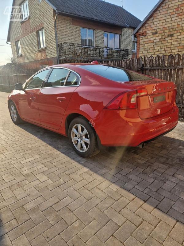 Red Volvo S60 2014 in Joniskis, with an engine capacity of 2.00 L and mileage of 276 thousand km for 7000 €, photo 5 on AUTOMOTO.COM.LV