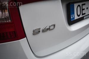 White Volvo S60 2014 in Riga, with an engine capacity of 2.00 L and mileage of 258 thousand km for 7350 €, photo 8 on AUTOMOTO.COM.LV