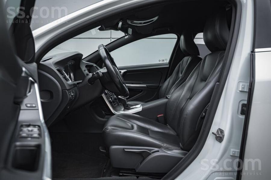 White Volvo S60 2014 in Riga, with an engine capacity of 2.00 L and mileage of 258 thousand km for 7350 €, photo 10 on AUTOMOTO.COM.LV