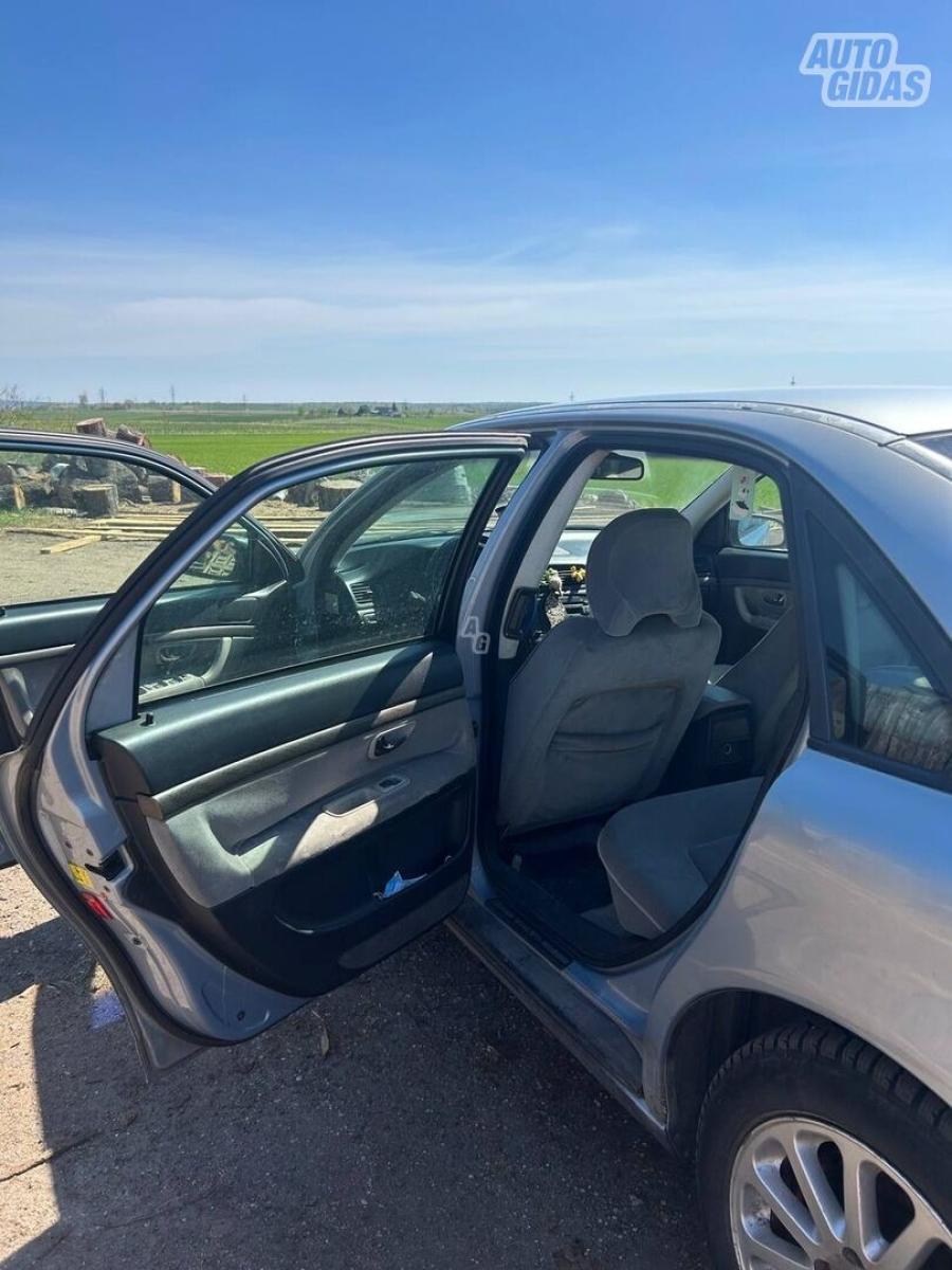 Volvo S80 1999 Kaišiadorys, ar dzinēja tilpumu 2.40 L un nobraukumu 400 tūkst. km par 700 €, foto 13 vietnē AUTOMOTO.COM.LV