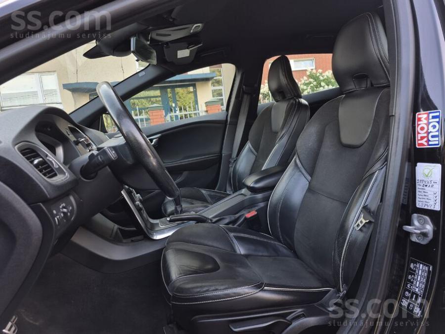 Black Volvo V40 2015 in Riga, with an engine capacity of 2.00 L and mileage of 280 thousand km for 5500 €, photo 10 on AUTOMOTO.COM.LV