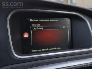 Black Volvo V40 2015 in Riga, with an engine capacity of 2.00 L and mileage of 280 thousand km for 5500 €, photo 15 on AUTOMOTO.COM.LV