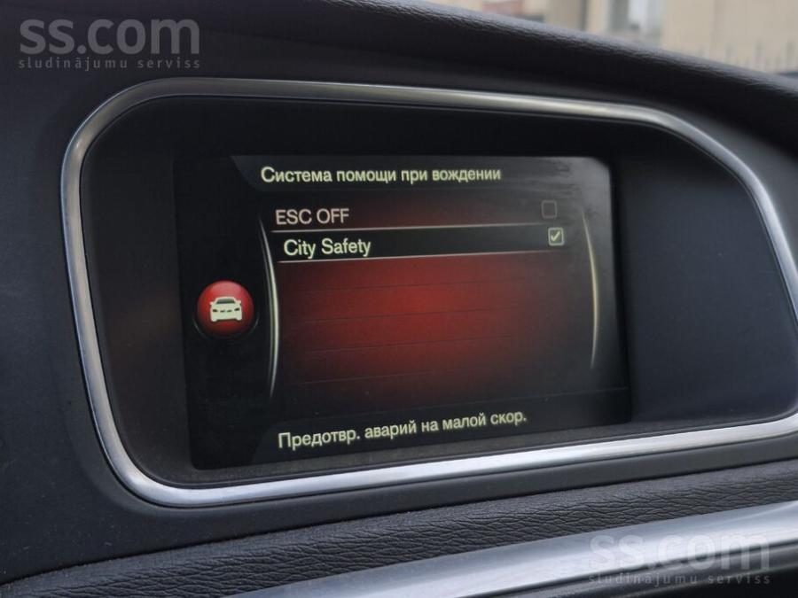 Black Volvo V40 2015 in Riga, with an engine capacity of 2.00 L and mileage of 280 thousand km for 5500 €, photo 15 on AUTOMOTO.COM.LV