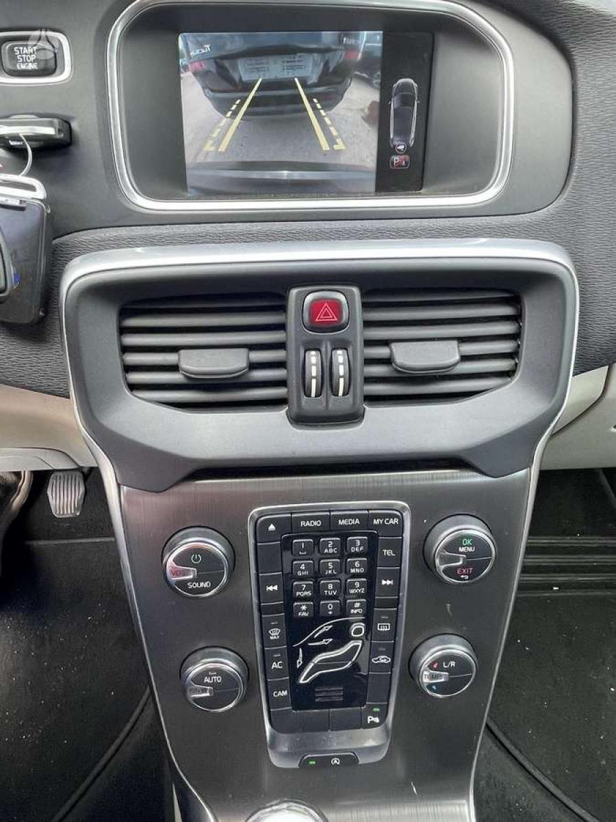 Black Volvo V40 2013 in Panevezys, with an engine capacity of 1.56 L and mileage of 245 thousand km for 5150 €, photo 13 on AUTOMOTO.COM.LV
