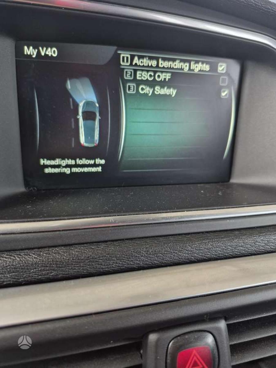 Black Volvo V40 2015 in Vilnius, with an engine capacity of 2.00 L and mileage of 300 thousand km for 6300 €, photo 8 on AUTOMOTO.COM.LV