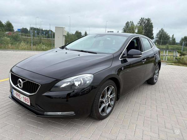Black Volvo V40 2016 in Taurage, with an engine capacity of 1.97 L and mileage of 307 thousand km for 6900 €, photo 1 on AUTOMOTO.COM.LV