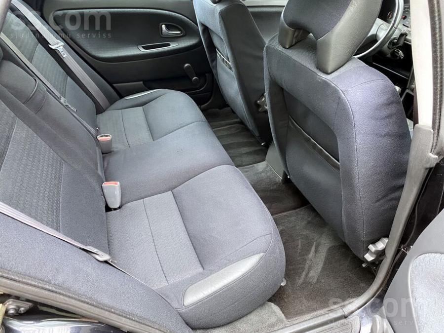 Black Volvo V40 2004 in Riga, with an engine capacity of 1.90 L and mileage of 330 thousand km for 1800 €, photo 14 on AUTOMOTO.COM.LV