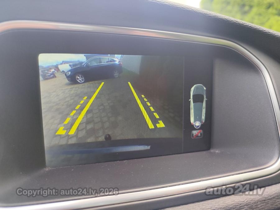 Blue Volvo V40 2015 in Paide, with an engine capacity of 2.00 L and mileage of 220 thousand km for 6990 €, photo 25 on AUTOMOTO.COM.LV