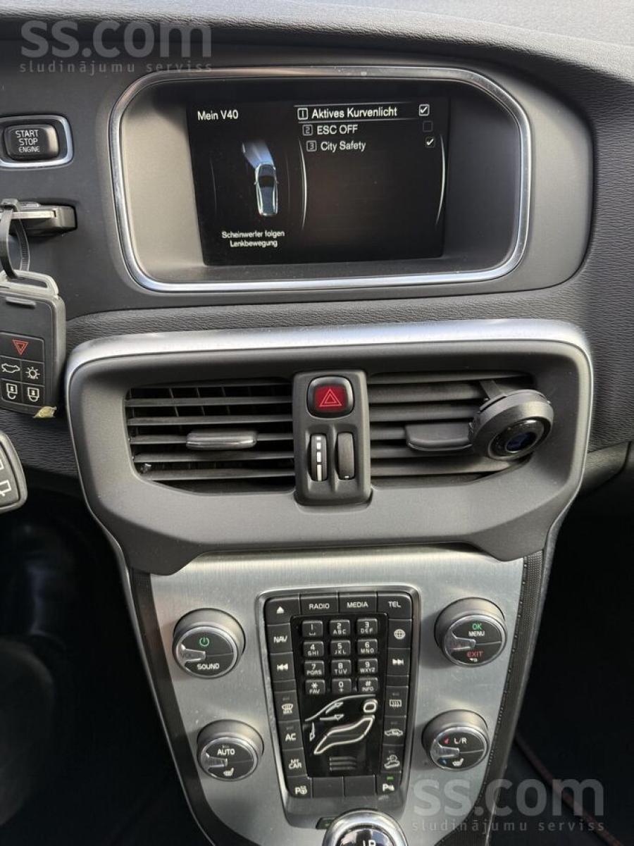 Blue Volvo V40 2015 in Riga, with an engine capacity of 2.00 L and mileage of 0 thousand km for 14500 €, photo 15 on AUTOMOTO.COM.LV