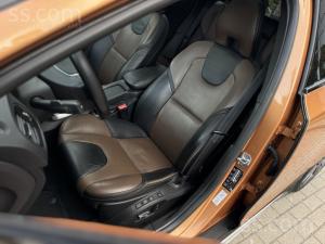 Brown Volvo V40 2013 in Jurmala, with an engine capacity of 2.50 L and mileage of 0 thousand km for 8800 €, photo 14 on AUTOMOTO.COM.LV
