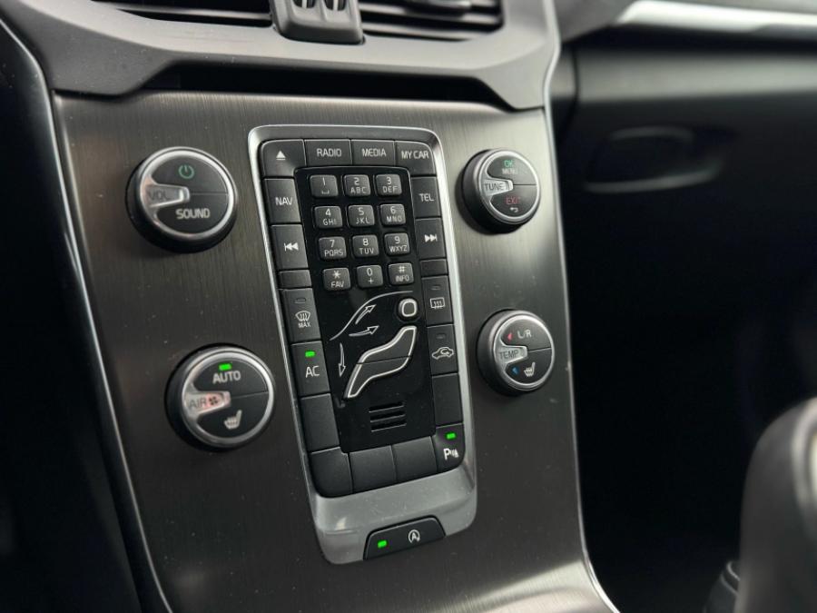 Grey Volvo V40 2013 in Riga, with an engine capacity of 1.60 L and mileage of 242 thousand km for 7990 €, photo 14 on AUTOMOTO.COM.LV