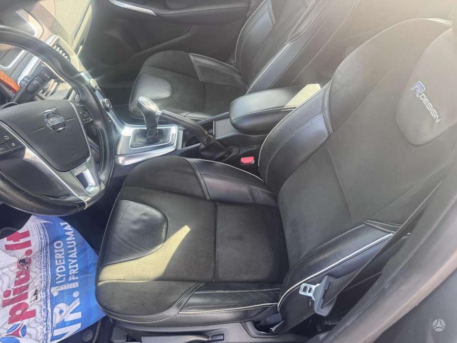 Grey Volvo V40 2014 in Alytus, with an engine capacity of 1.56 L and mileage of 273 thousand km for 6550 €, photo 14 on AUTOMOTO.COM.LV