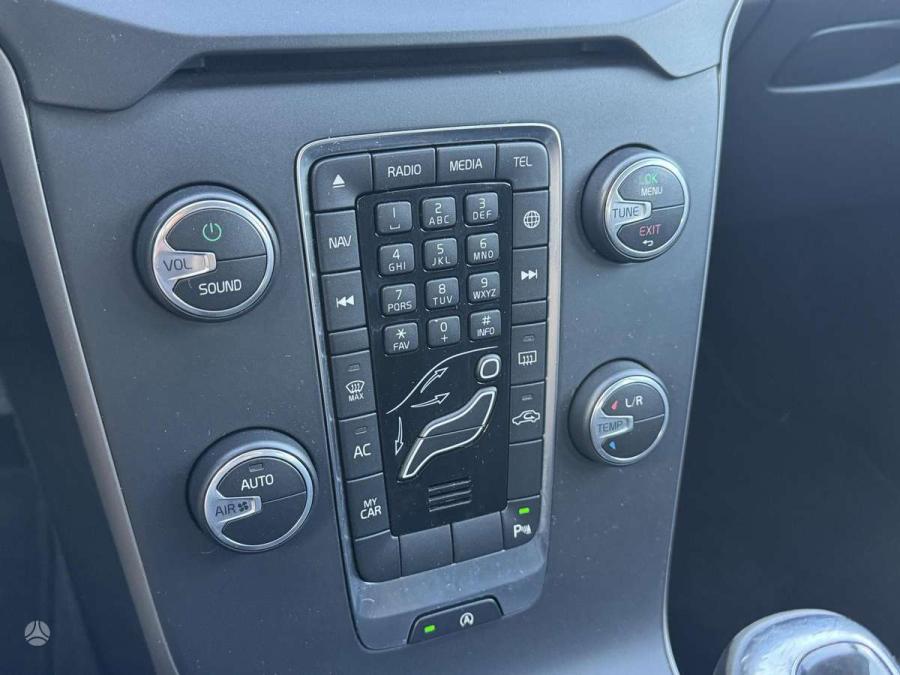 Grey Volvo V40 2015 in Taurage, with an engine capacity of 1.56 L and mileage of 262 thousand km for 5200 €, photo 14 on AUTOMOTO.COM.LV
