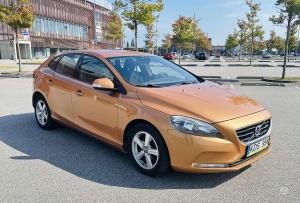 Oranžs Volvo V40 2013 Klaipėda, ar dzinēja tilpumu 1.56 L un nobraukumu 188 tūkst. km par 6900 €, foto  vietnē AUTOMOTO.COM.LV