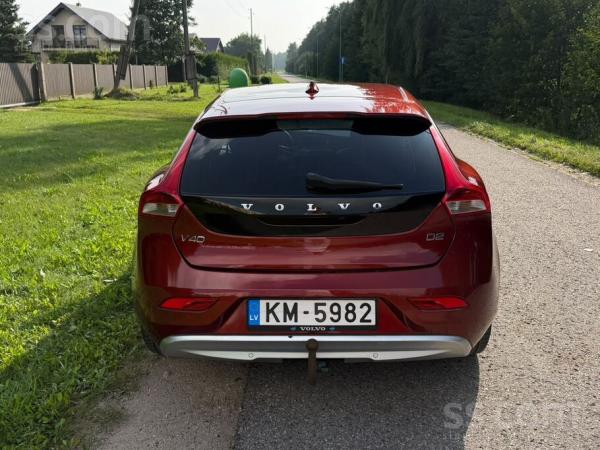 Red Volvo V40 2013 in Riga, with an engine capacity of 1.60 L and mileage of 306 thousand km for 5590 €, photo 6 on AUTOMOTO.COM.LV