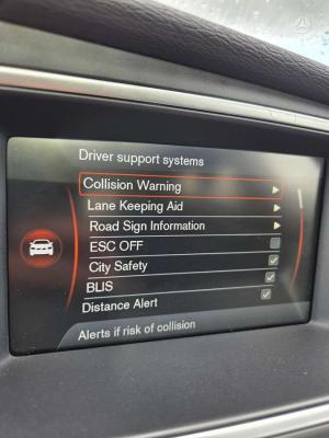 White Volvo V40 2012 in Kaunas, with an engine capacity of 1.98 L and mileage of 255 thousand km for 7250 €, photo 16 on AUTOMOTO.COM.LV