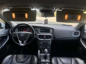 White Volvo V40 2013 in Vilnius, with an engine capacity of 1.56 L and mileage of 303 thousand km for 4990 €, photo 21 on AUTOMOTO.COM.LV