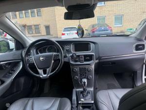White Volvo V40 2013 in Kaunas, with an engine capacity of 1.56 L and mileage of 323 thousand km for 5200 €, photo 6 on AUTOMOTO.COM.LV